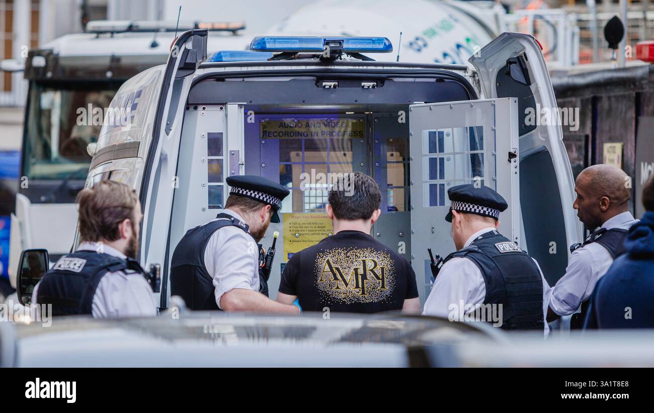 A suspect is arrested following a police car chase across central ...