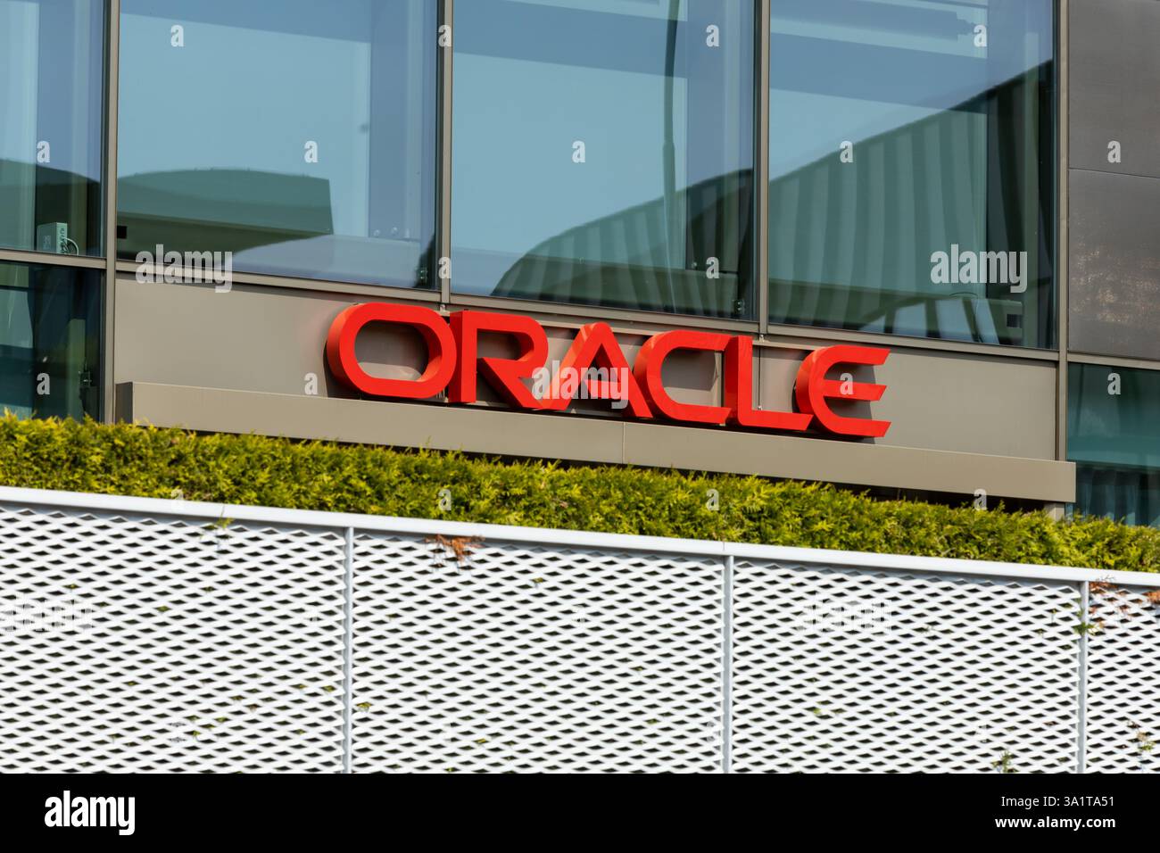 Oracle sign logo above the entrance of an office in Utrecht. Oracle is ...
