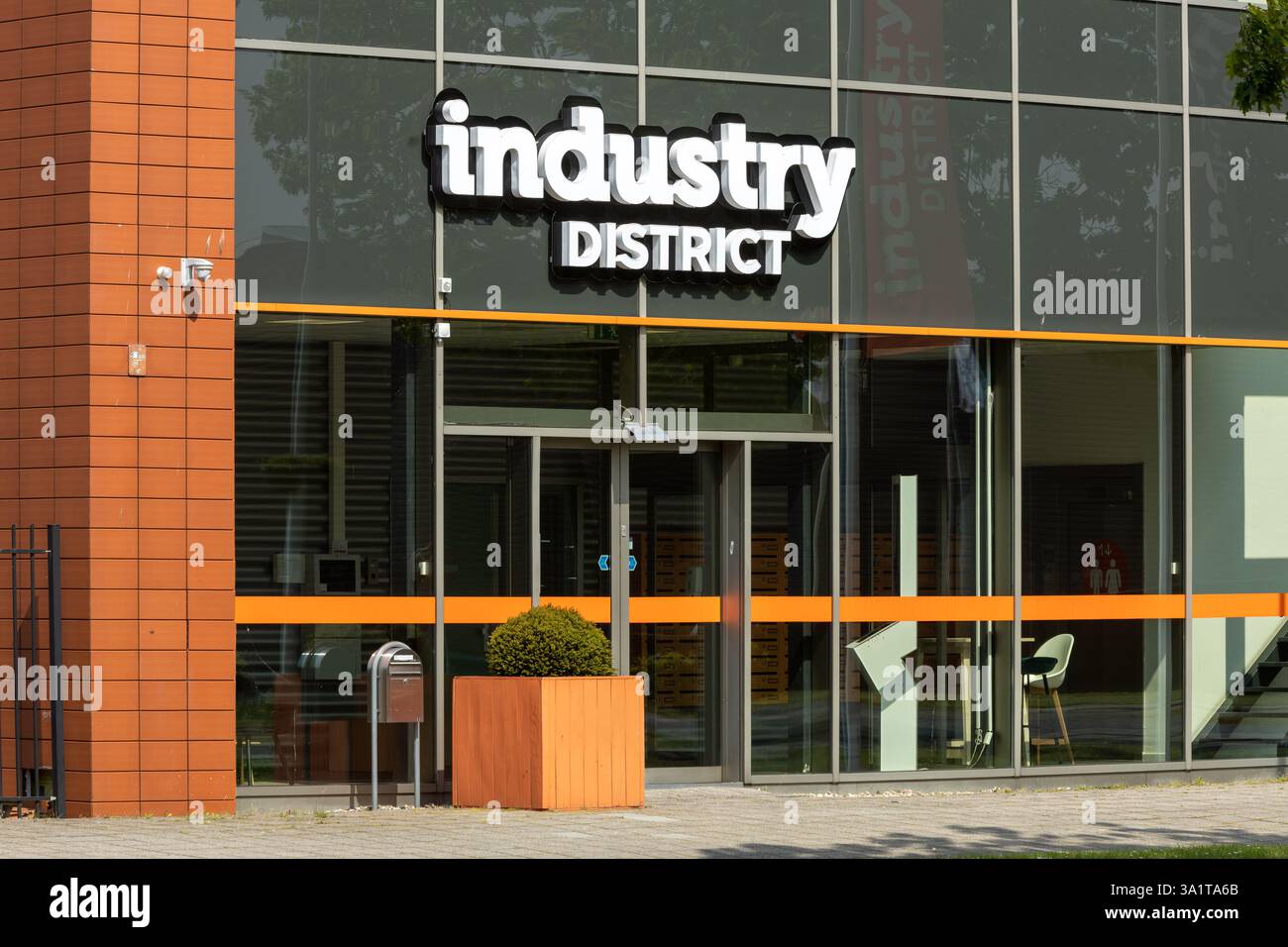 Industry district sign logo. The Industry District spaces are places where you can work, meet ...