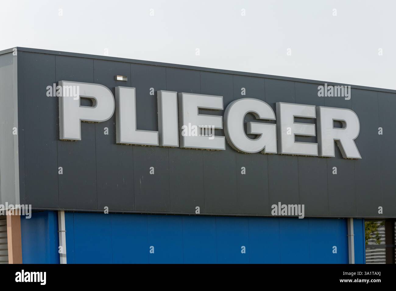 Plieger sign logo on the showroom. Plieger specializes in plumbing ...