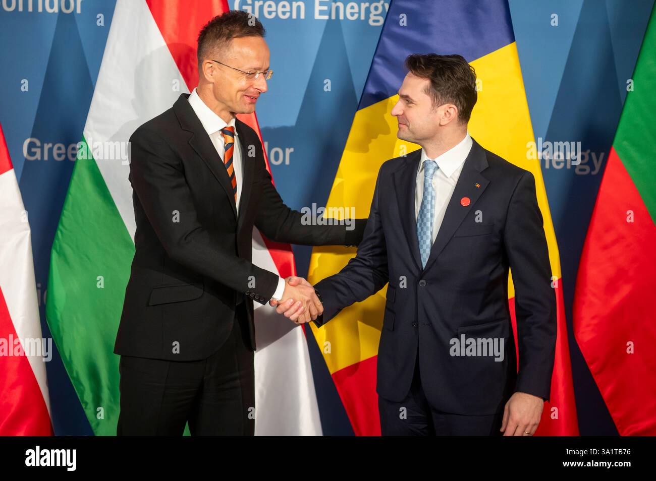 Hungarian Minister of Foreign Affairs and Trade Peter Szijjarto, left ...