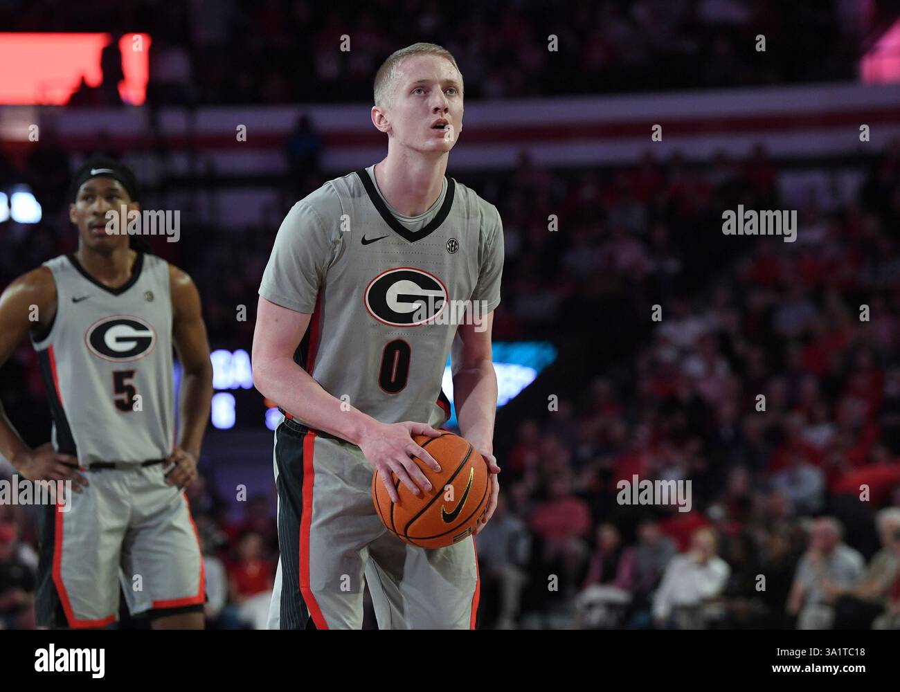 ATHENS, GA - MARCH 08: Georgia Bulldogs guard Blue Cain (0) shoots a ...