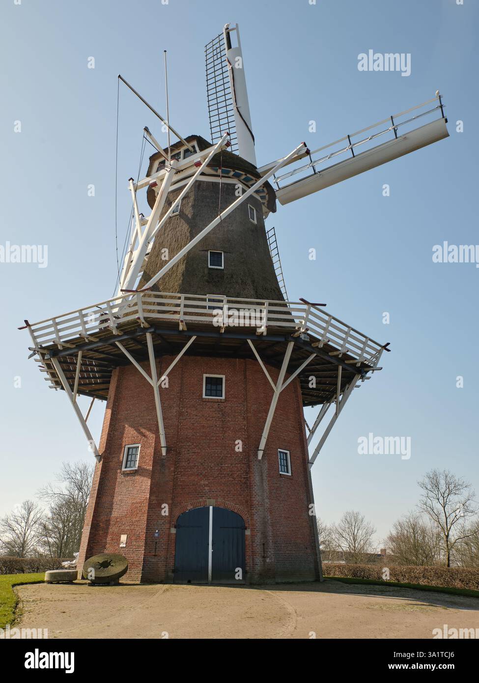 March 6, 2025 - Dokkum, Netherlands: Traditional Dutch windmill ...