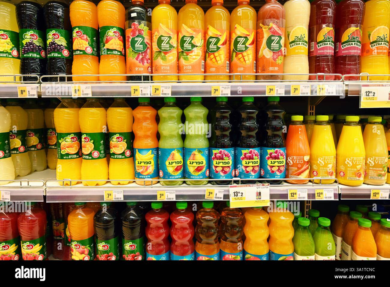 fruit juices in a grocery store Stock Photo - Alamy