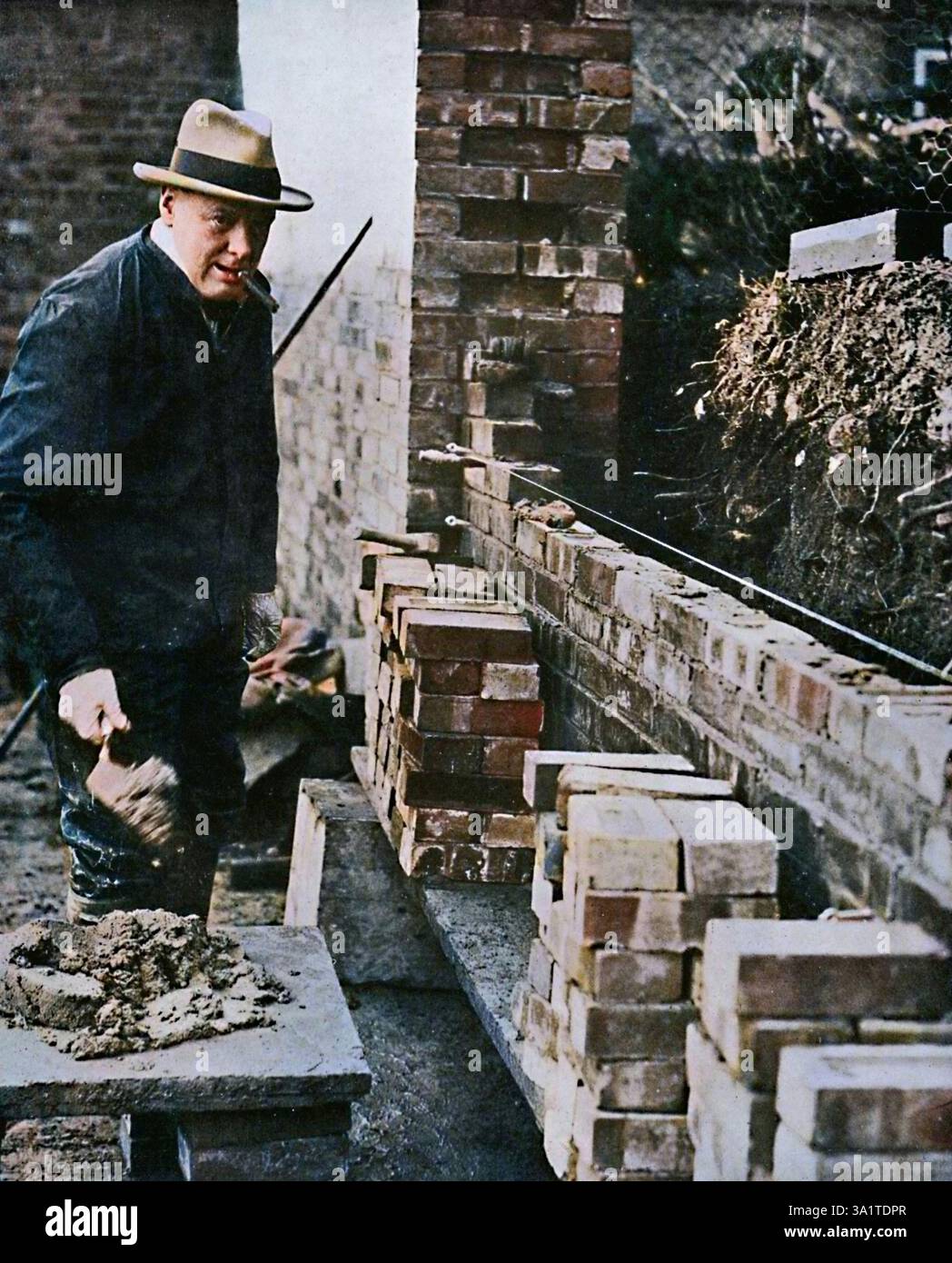 'A hobby', c1930, (1945). Winston Churchill building a wall at his home ...