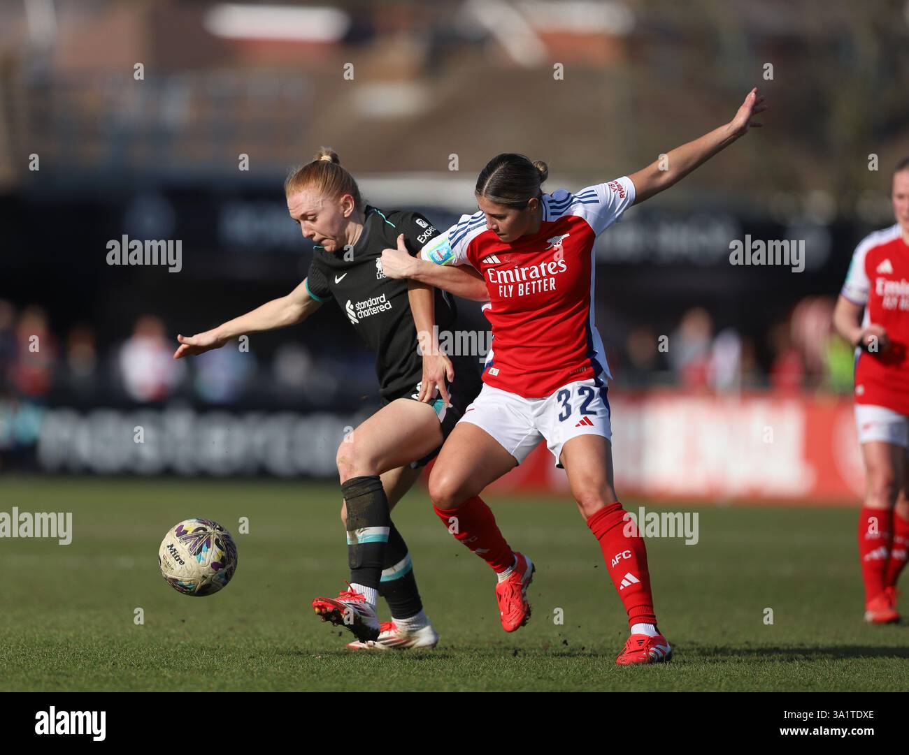 Liverpools Ceri Holland and Arsenals Kyra Cooney Cross challenge for ...