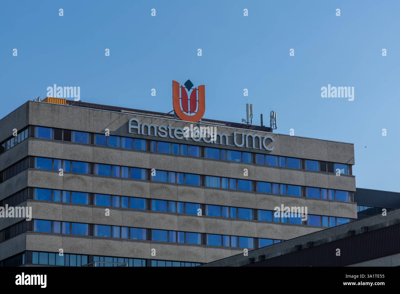 Amsterdam UMC Sign logo on the hospital. Amsterdam UMC is a medical ...