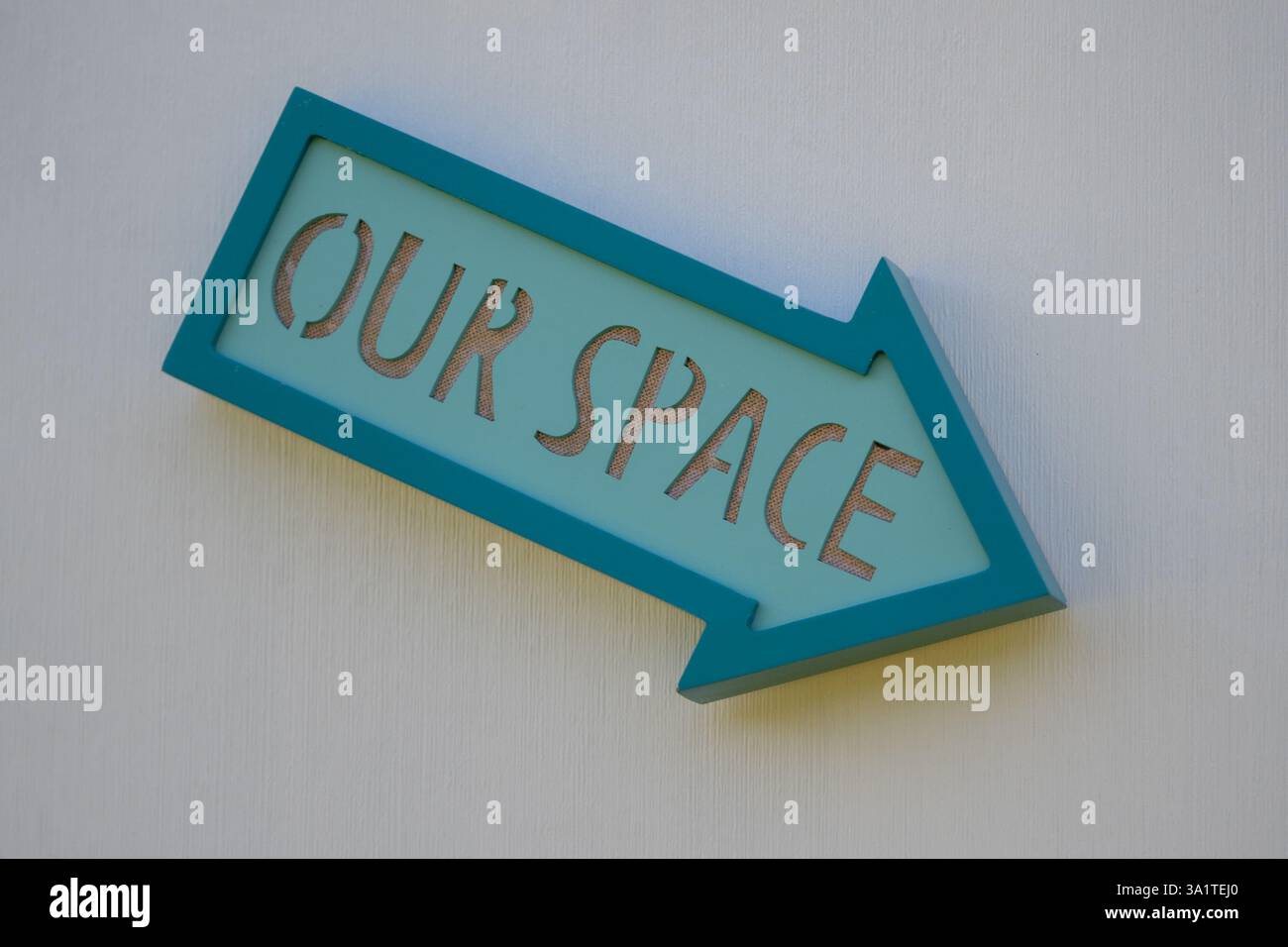 Blue sign on the wall with text Our Space. Business concept Stock Photo ...