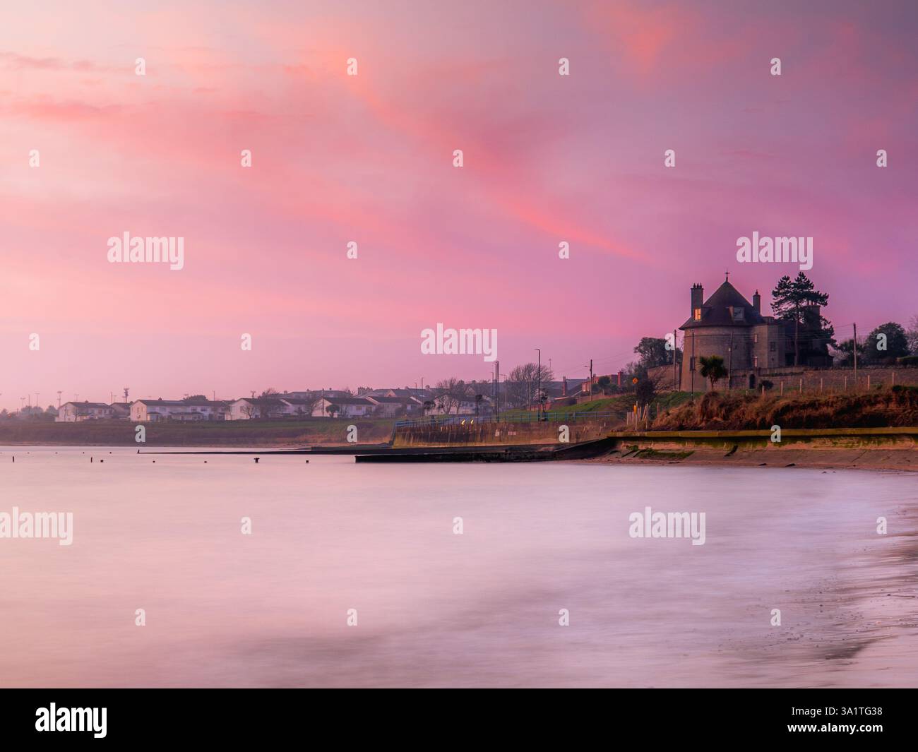 Sunrise sky over Hick's Tower, Malahide Stock Photo - Alamy