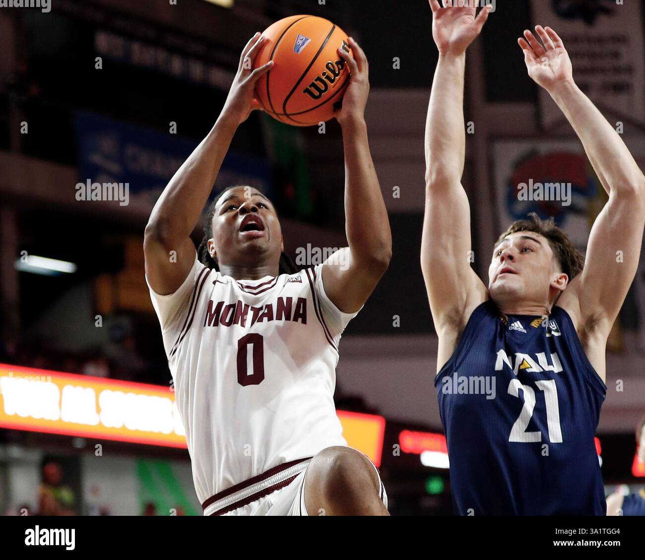 March 09, 2025: Montana Grizzlies guard Money Williams (0) goes in for ...