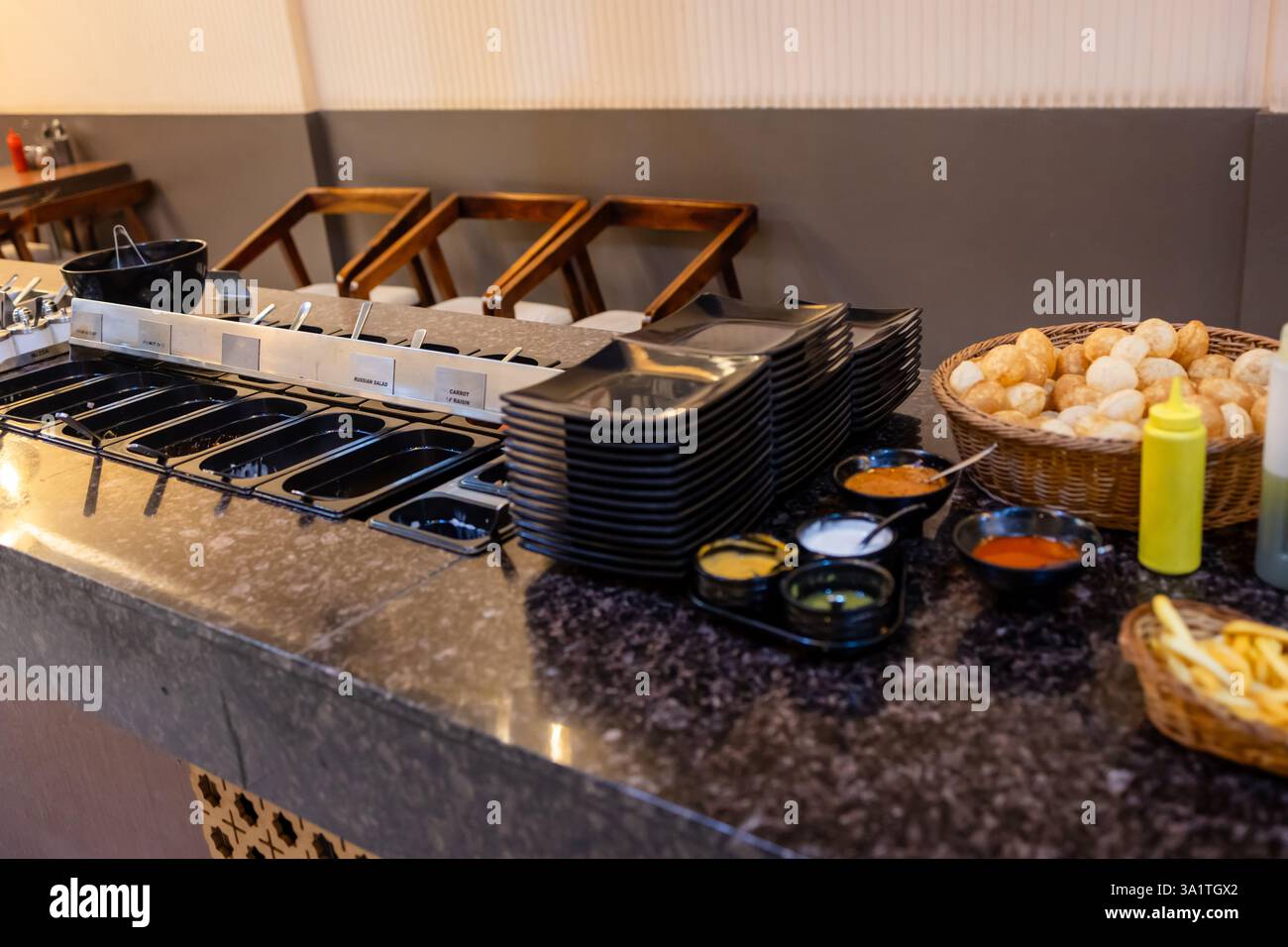 unlimited buffet counter with many items kept for self service at ...