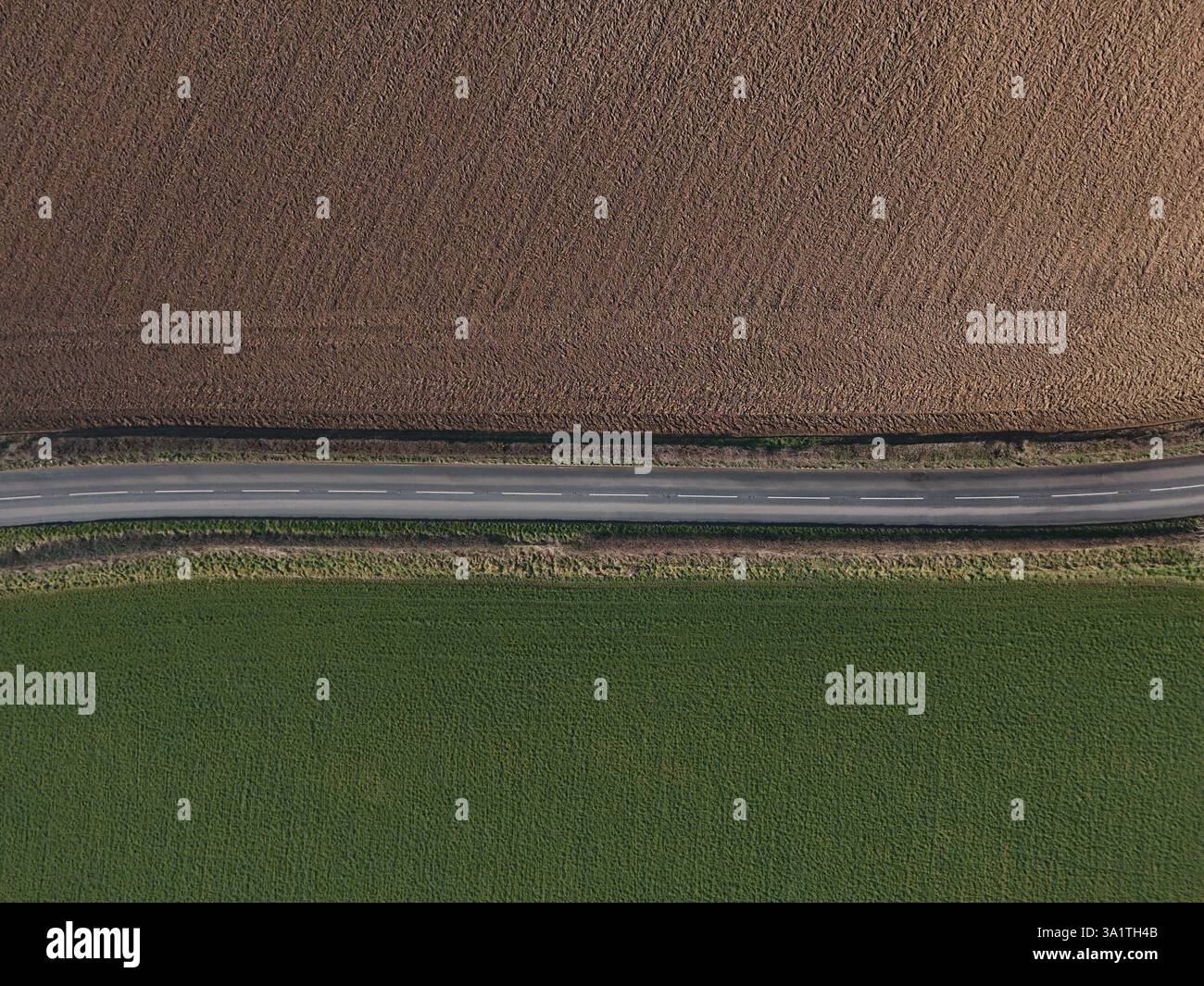 Aerial of countryside road in rural farming community, england UK Stock ...