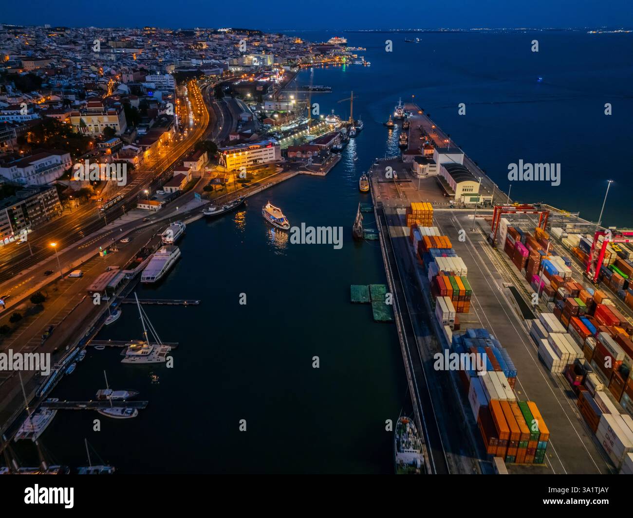Aerial view of an illuminated Port of Lisbon at night Stock Photo - Alamy