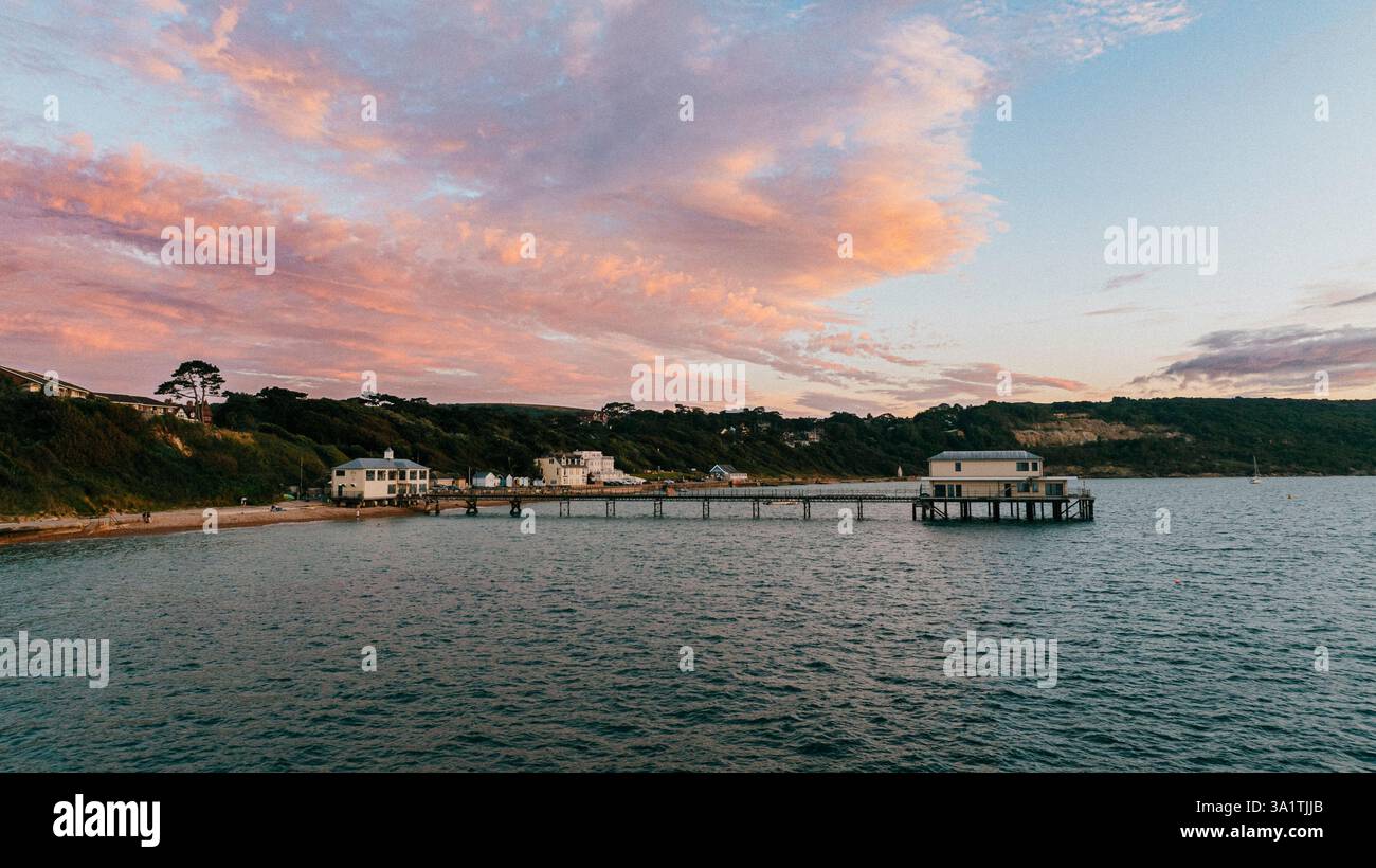 The Peer at Totland on a summers evening with a beautiful sunset Stock ...