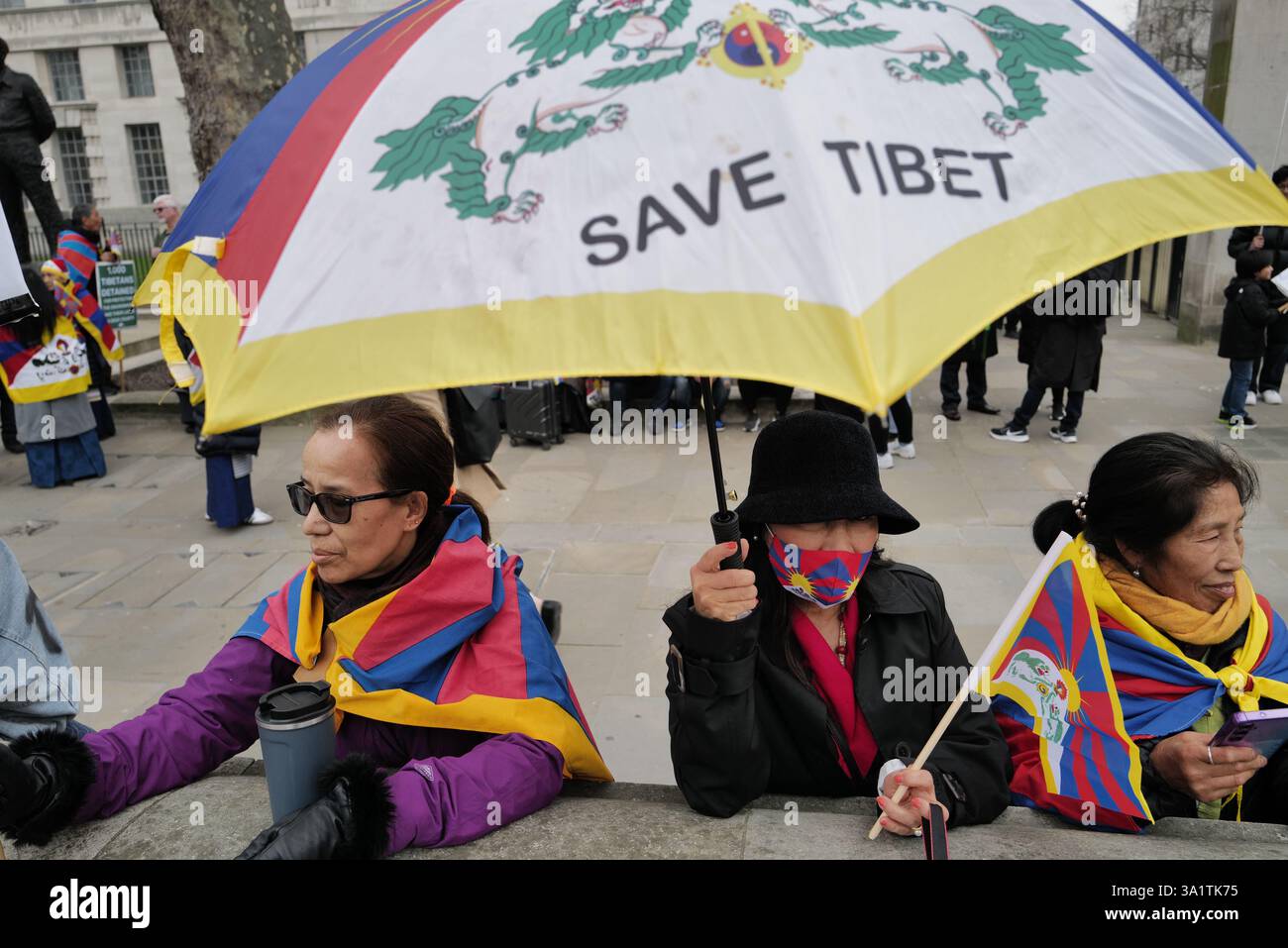 Protesters gather outside Downing Street to mark the 66th anniversary ...