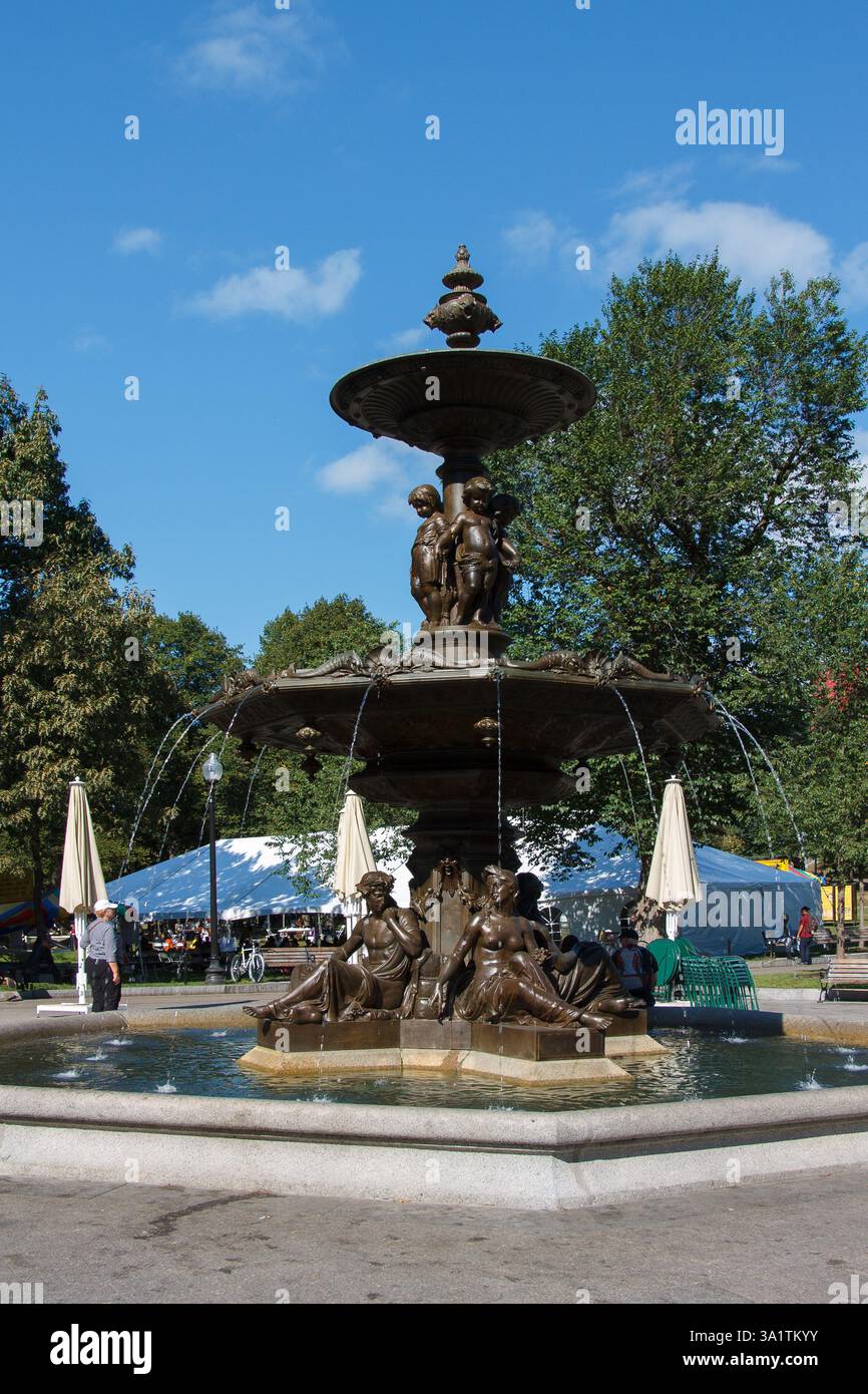 The Brewer fountain at Boston Common Park and a modern office building ...