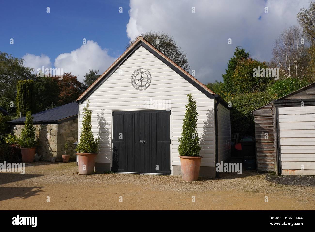 garden storage barn. lock up shed in village Stock Photo - Alamy