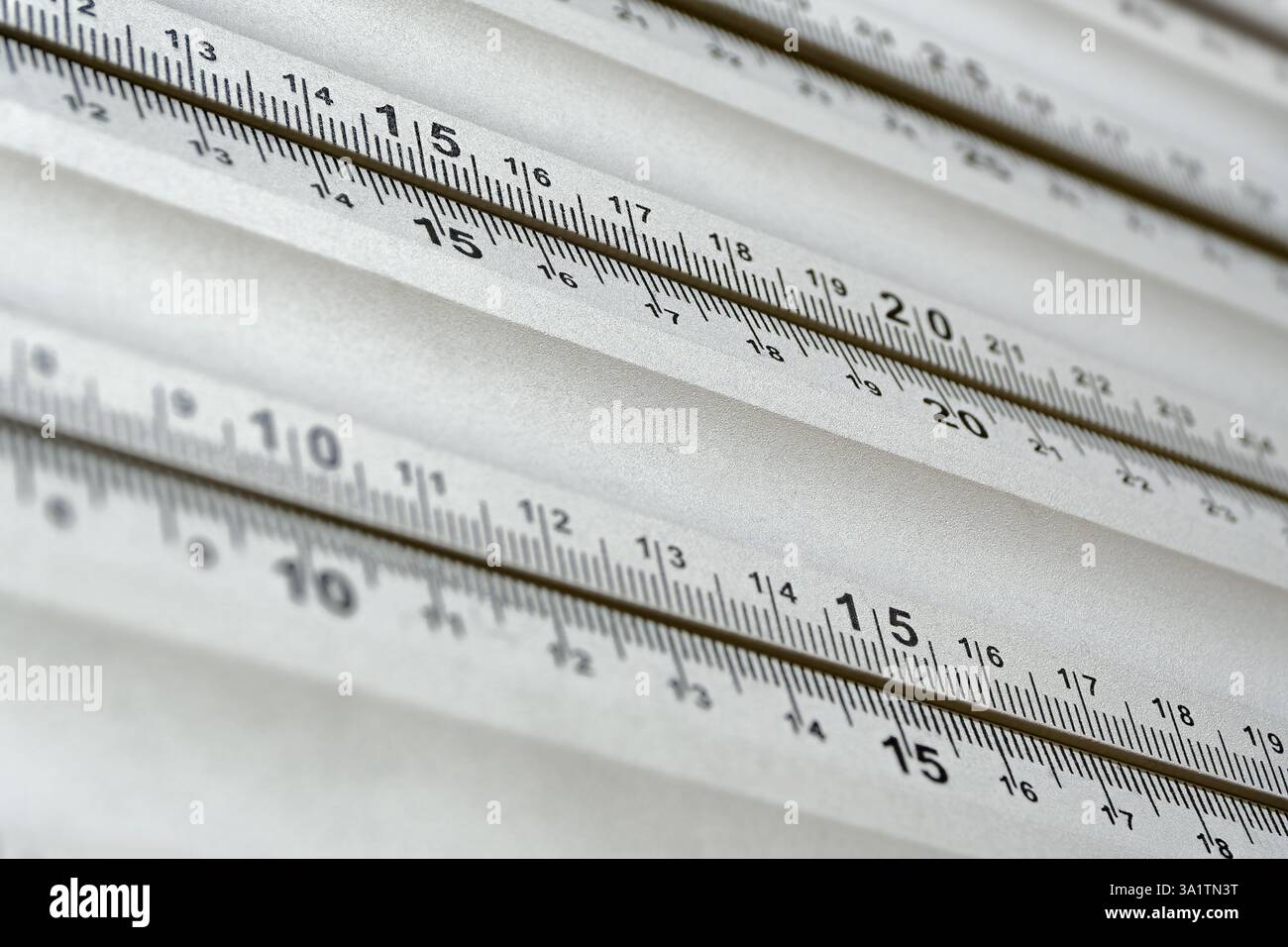 Group of metal rulers, close up shot, abstract background Stock Photo ...