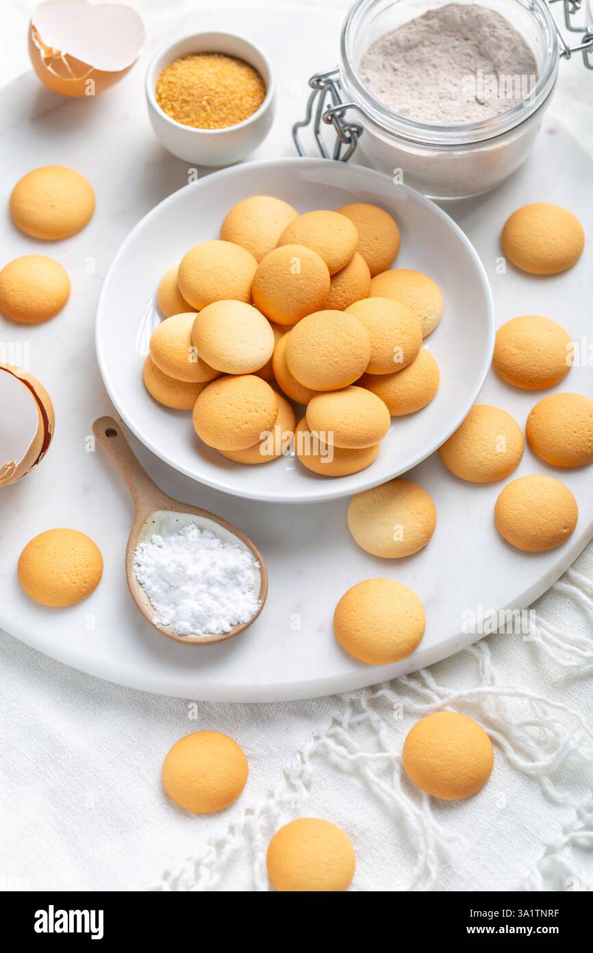 Small sponge cookies, biscuit butter cookies with ingredients Stock ...