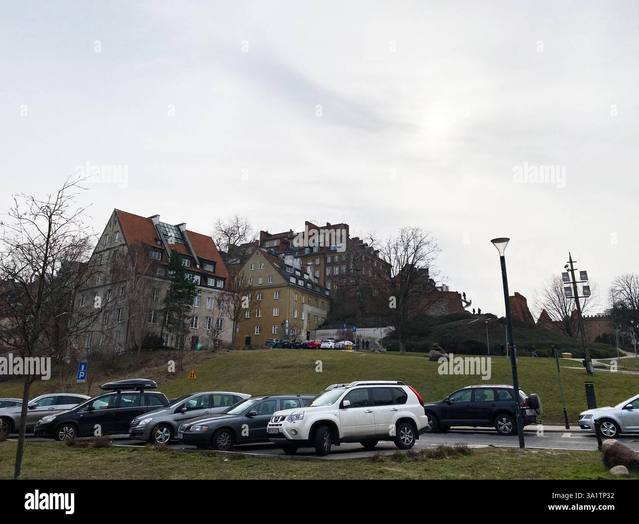 Warsaw, Poland - March 09, 2025: Urban view featuring parked cars ...