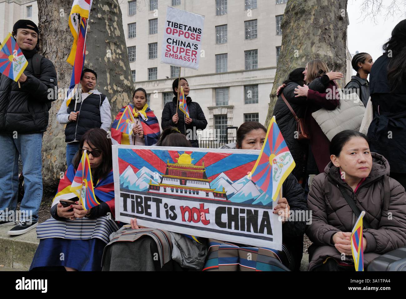 Protesters gather outside Downing Street to mark the 66th anniversary ...