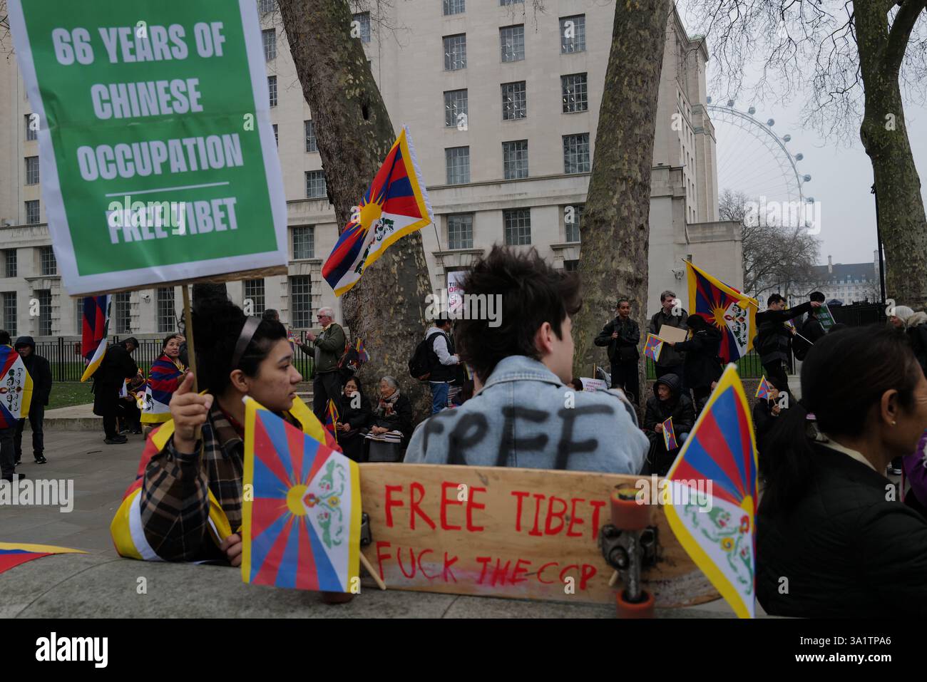 Protesters gather outside Downing Street to mark the 66th anniversary ...