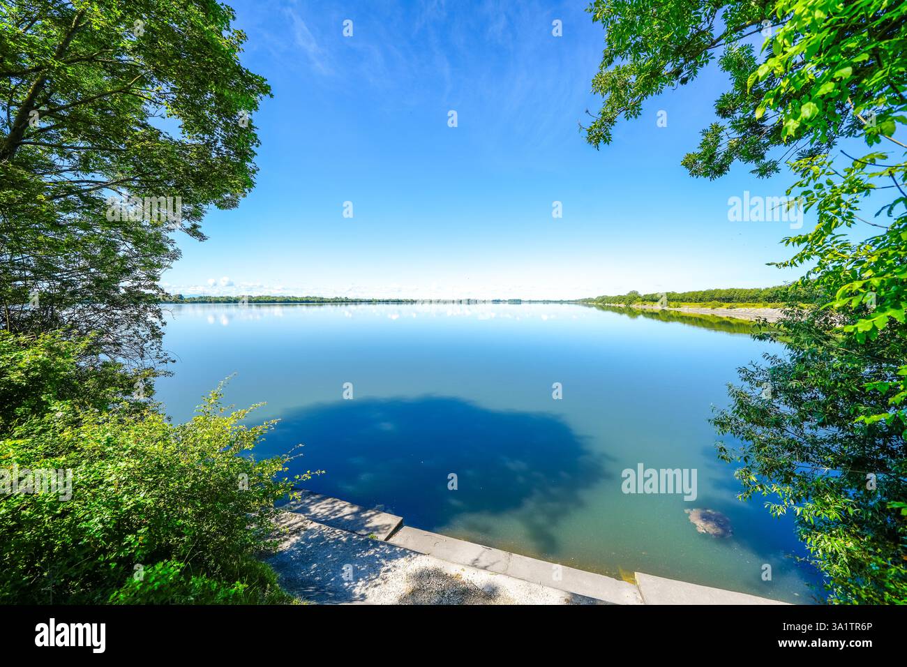 View of the Ismaning reservoir and the surrounding nature. Landscape at ...