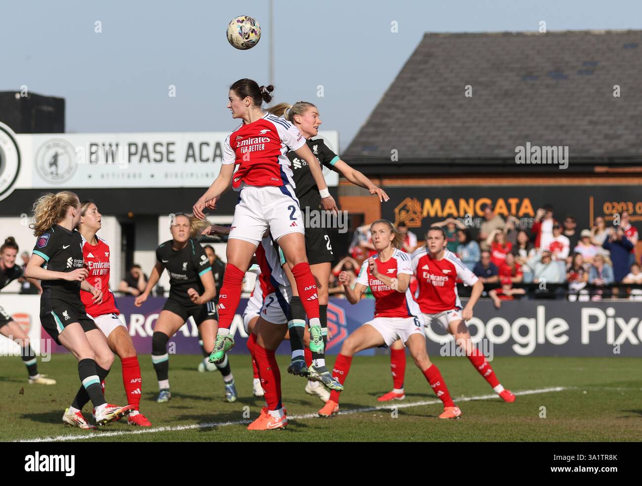 Emily Fox of Arsenal jumps for the ball during an Arsenal corner during ...