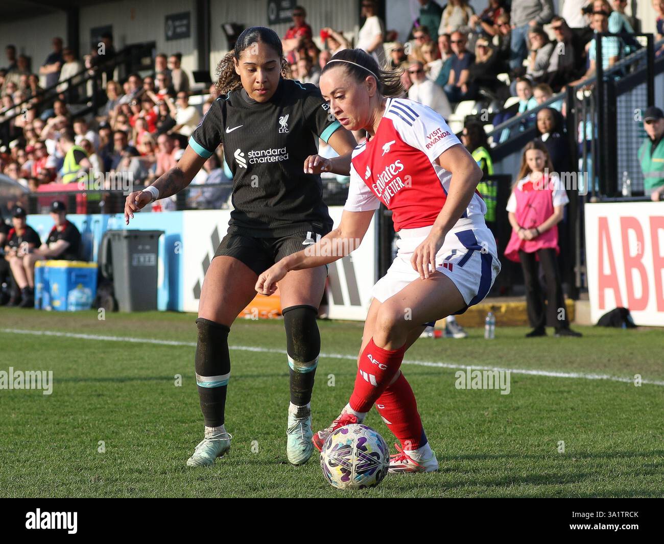 Katie McCabe's cross is blocked by Olivia Smith during the Adobe Women ...