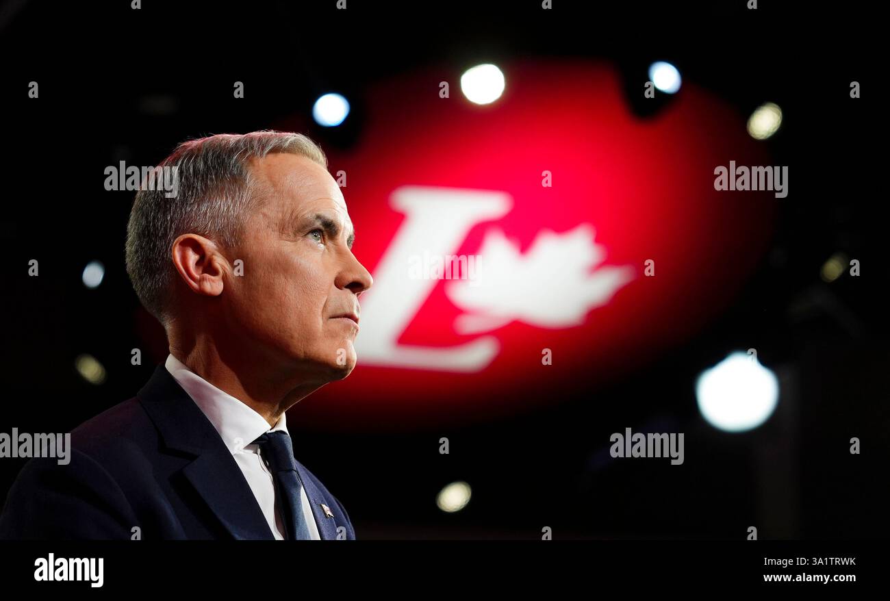 Liberal Party of Canada leadership candidate Mark Carney looks on as ...