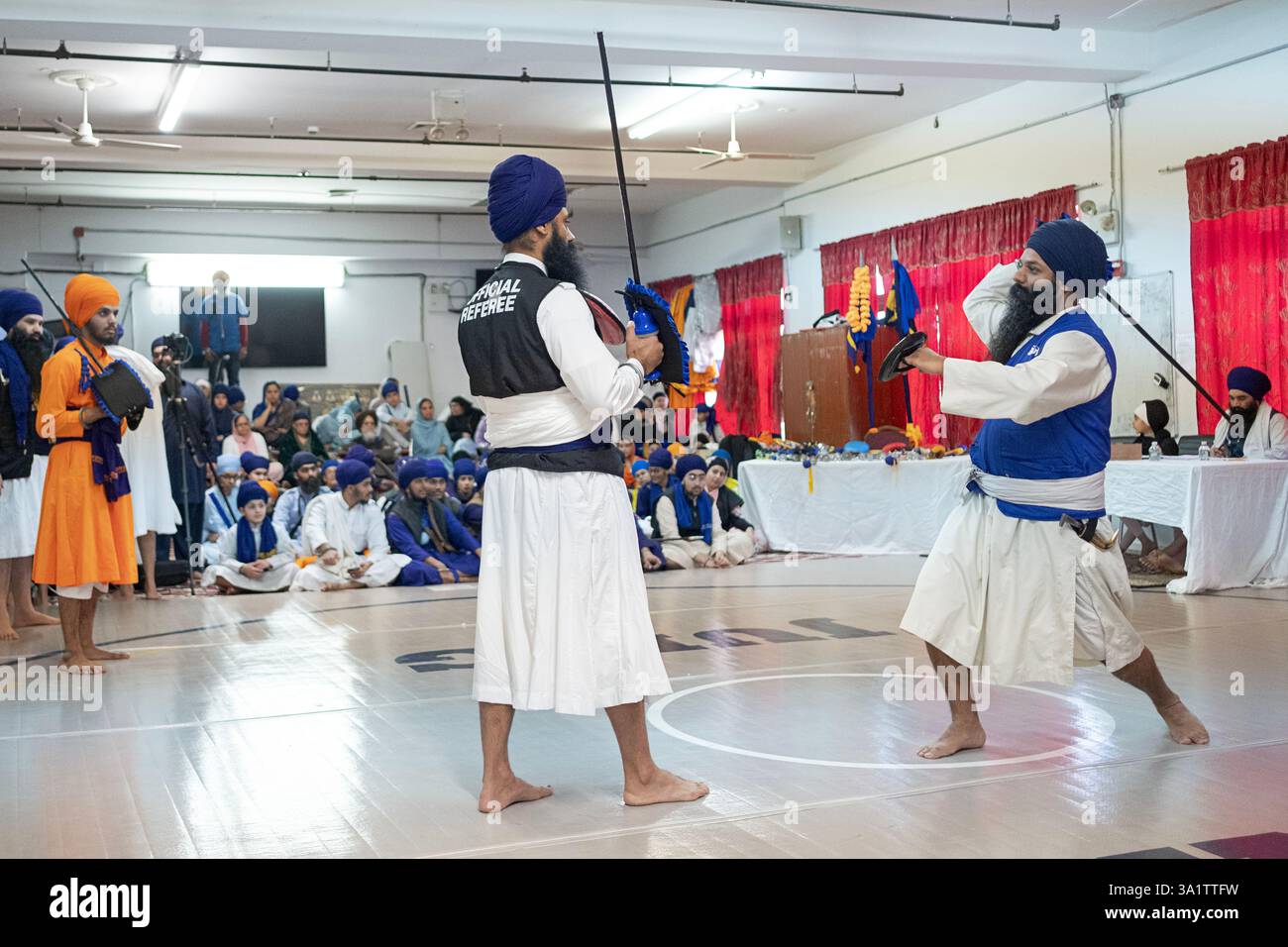 At a gatka Sikh religious martial arts tournament boys were instructed ...