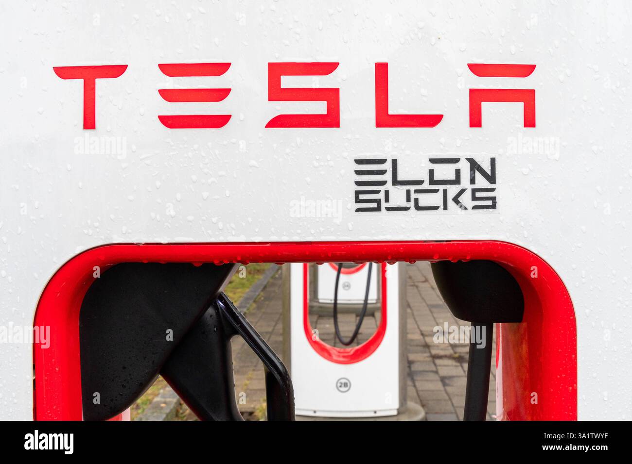 Bavaria, Germany - March 10, 2025: A Tesla Supercharger with a critical ...