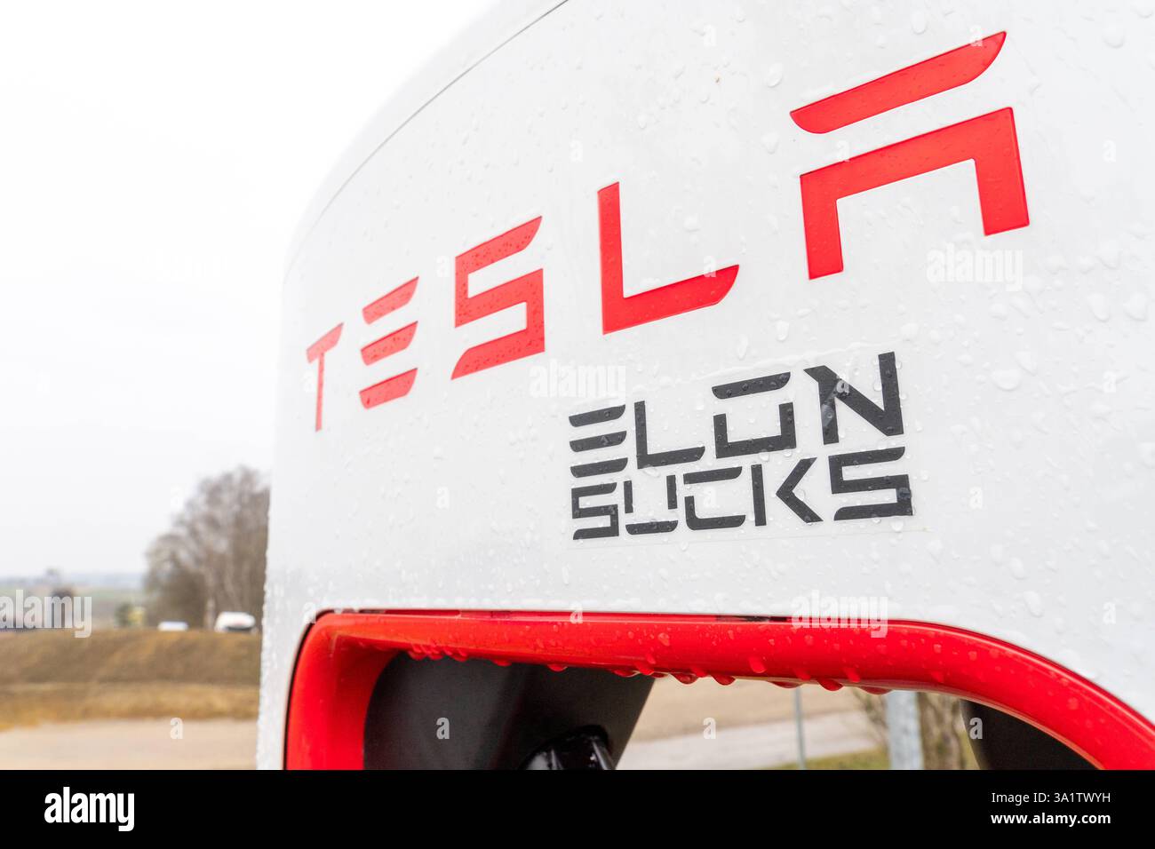 Bavaria, Germany - March 10, 2025: A Tesla Supercharger with a critical ...