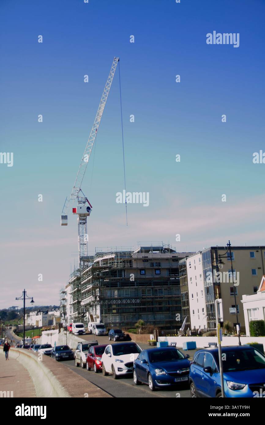 Tower Crane working on Building at Seaton Devon England uk Stock Photo ...