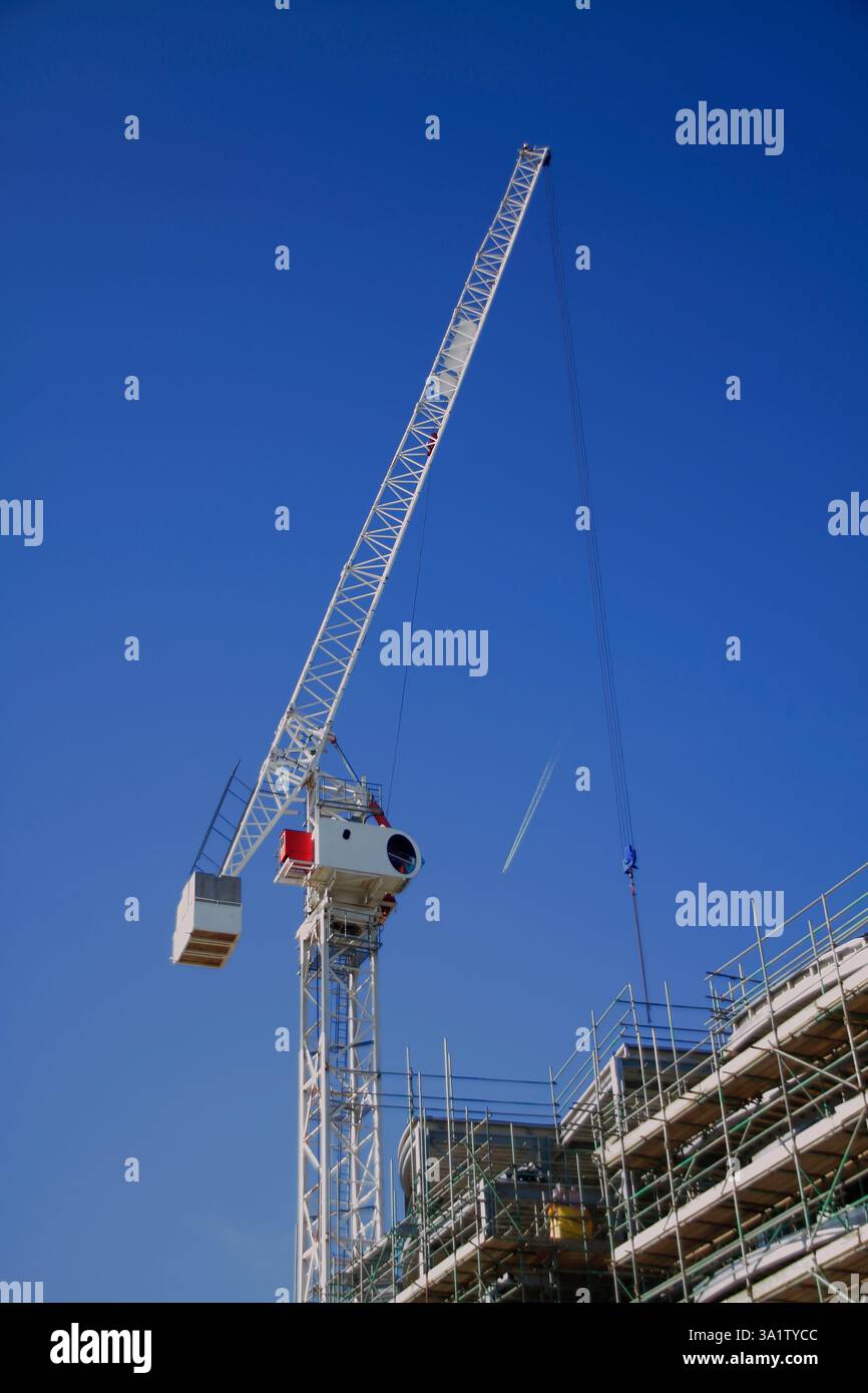 Tower Crane working on Building at Seaton Devon England uk Stock Photo ...