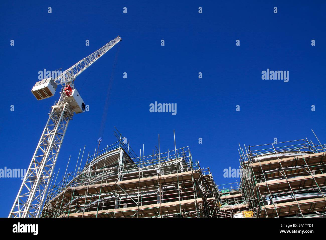 Tower Crane working on Building at Seaton Devon England uk Stock Photo ...