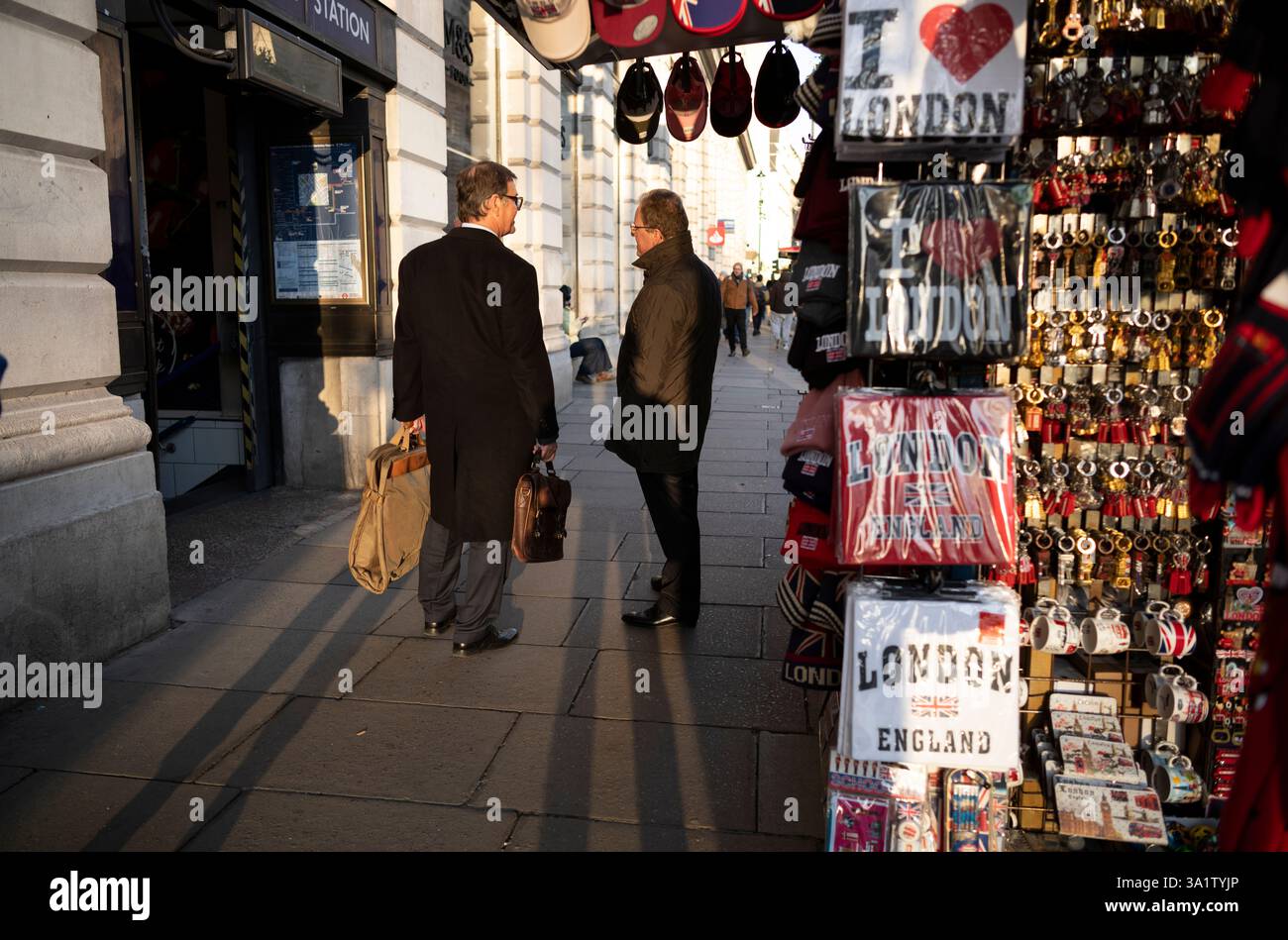 Businessmen go about their lives outside Green Park Underground Station, situated on Piccadilly ...