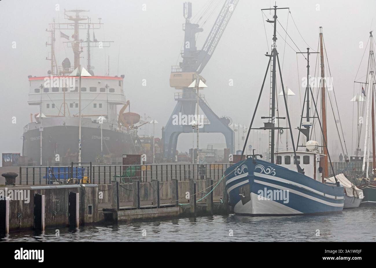 10 March 2025, Mecklenburg-Western Pomerania, Rostock: Boats in the ...