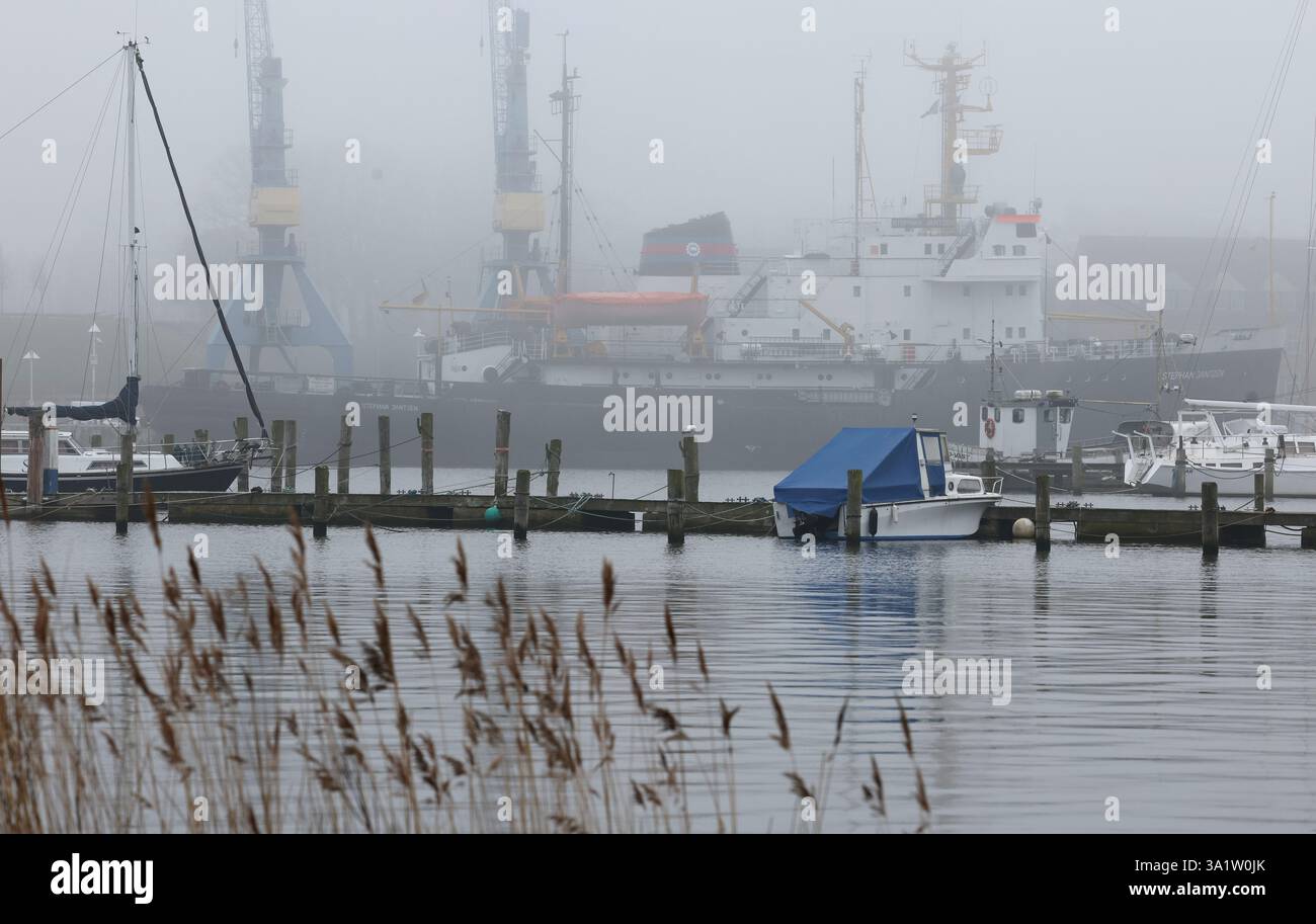 Rostock, Germany. 10th Mar, 2025. Boats and the museum icebreaker ...