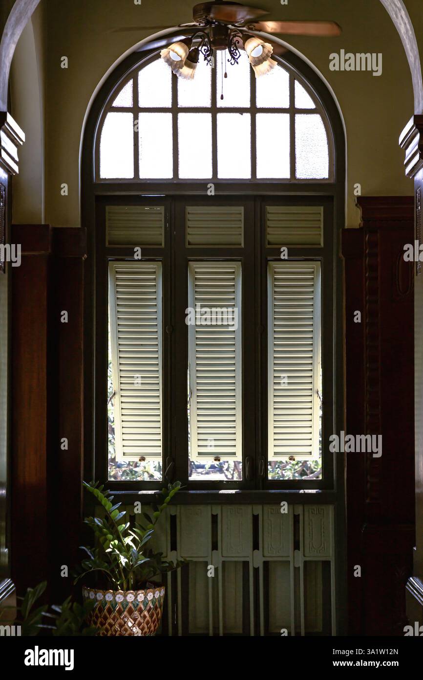 Bangkok, Thailand - Mar 02, 2025 - View of Three wooden louvered window ...