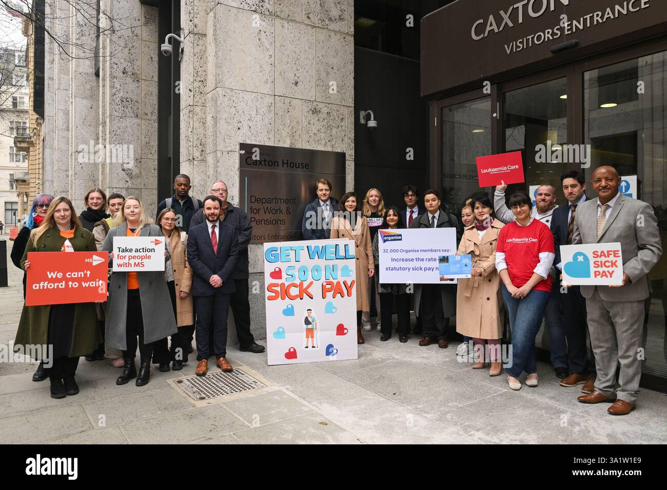 EDITORIAL USE ONLY Campaigners from the Safe Sick Pay coalition deliver ...
