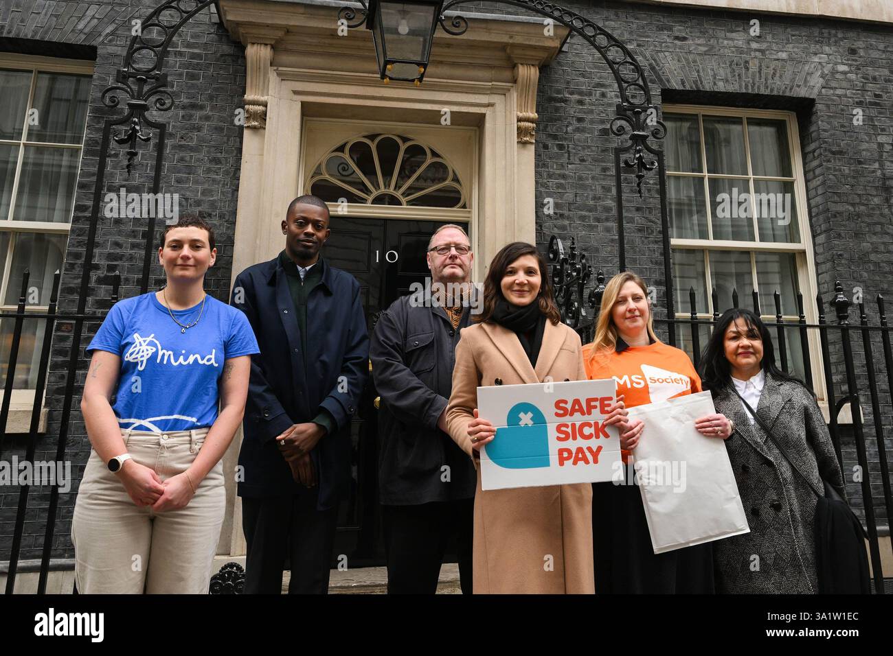 EDITORIAL USE ONLY Campaigners from the Safe Sick Pay coalition, (left ...