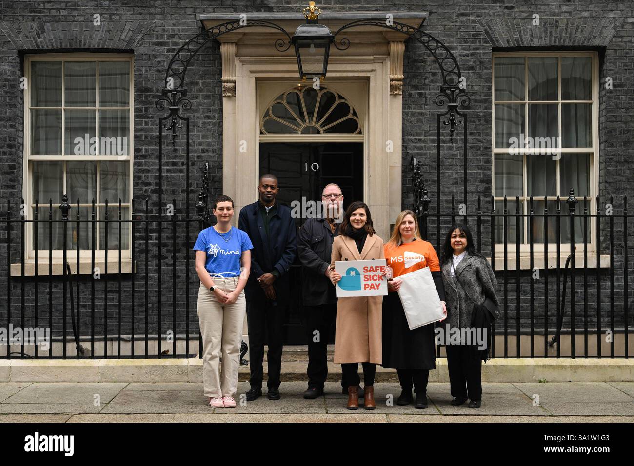 EDITORIAL USE ONLY Campaigners from the Safe Sick Pay coalition, (left ...