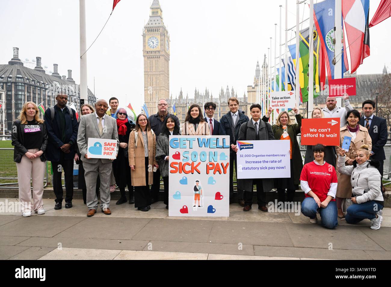 EDITORIAL USE ONLY Campaigners from the Safe Sick Pay coalition with a ...