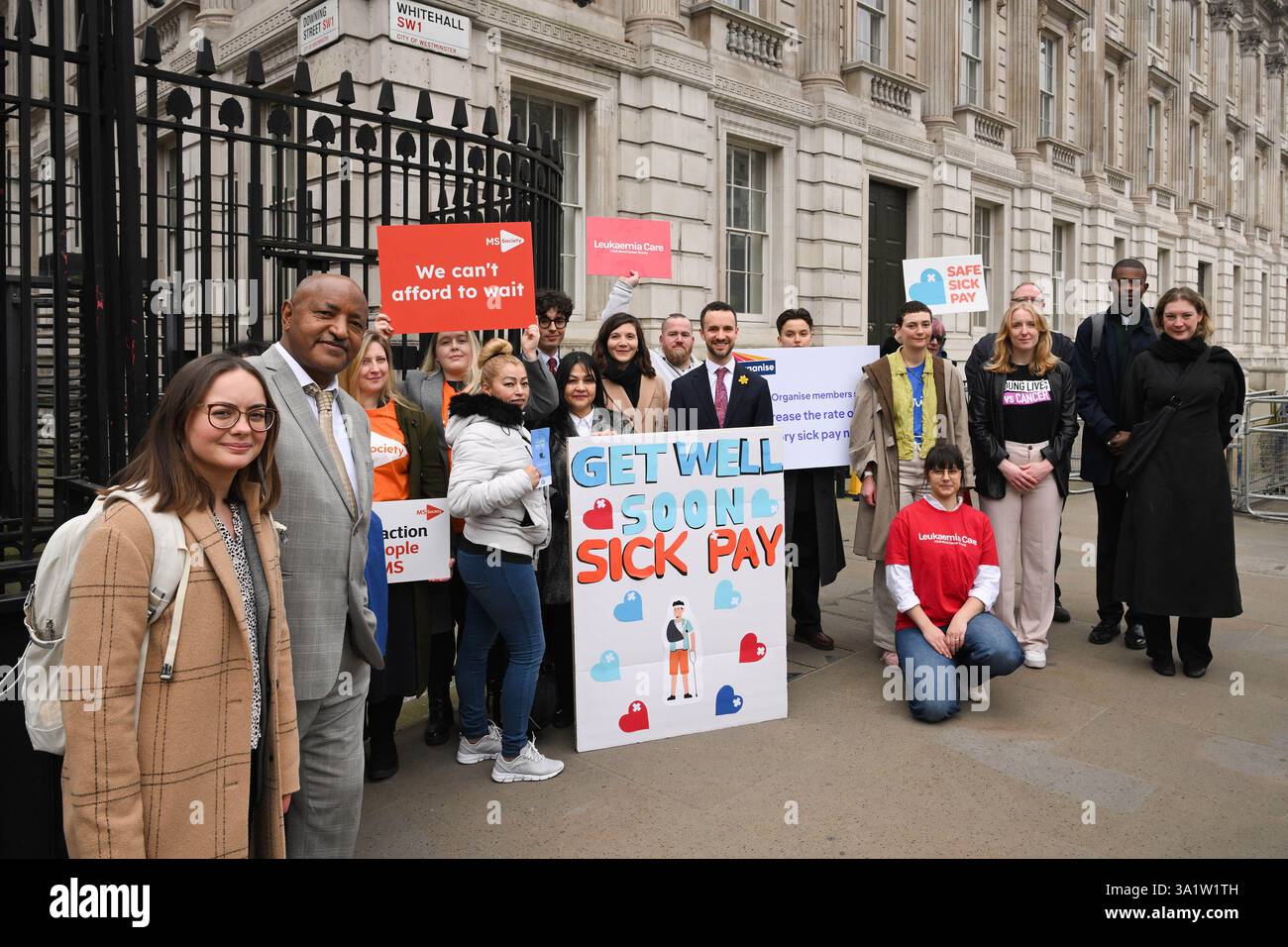 EDITORIAL USE ONLY Campaigners from the Safe Sick Pay coalition deliver ...