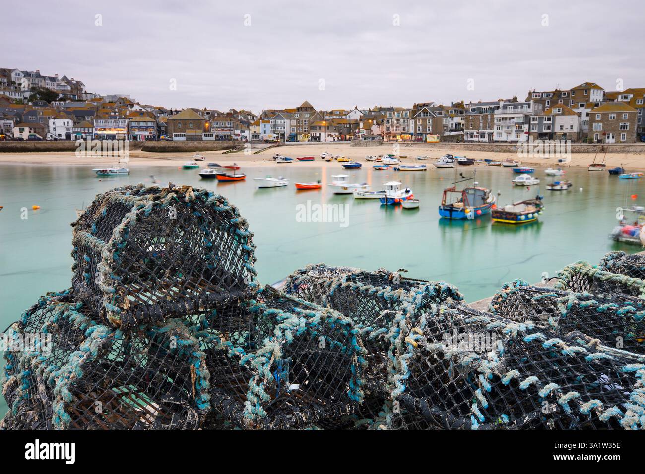 Lobster Pots on the harbour wall at St Ives, Cornwall, England. Autumn ...