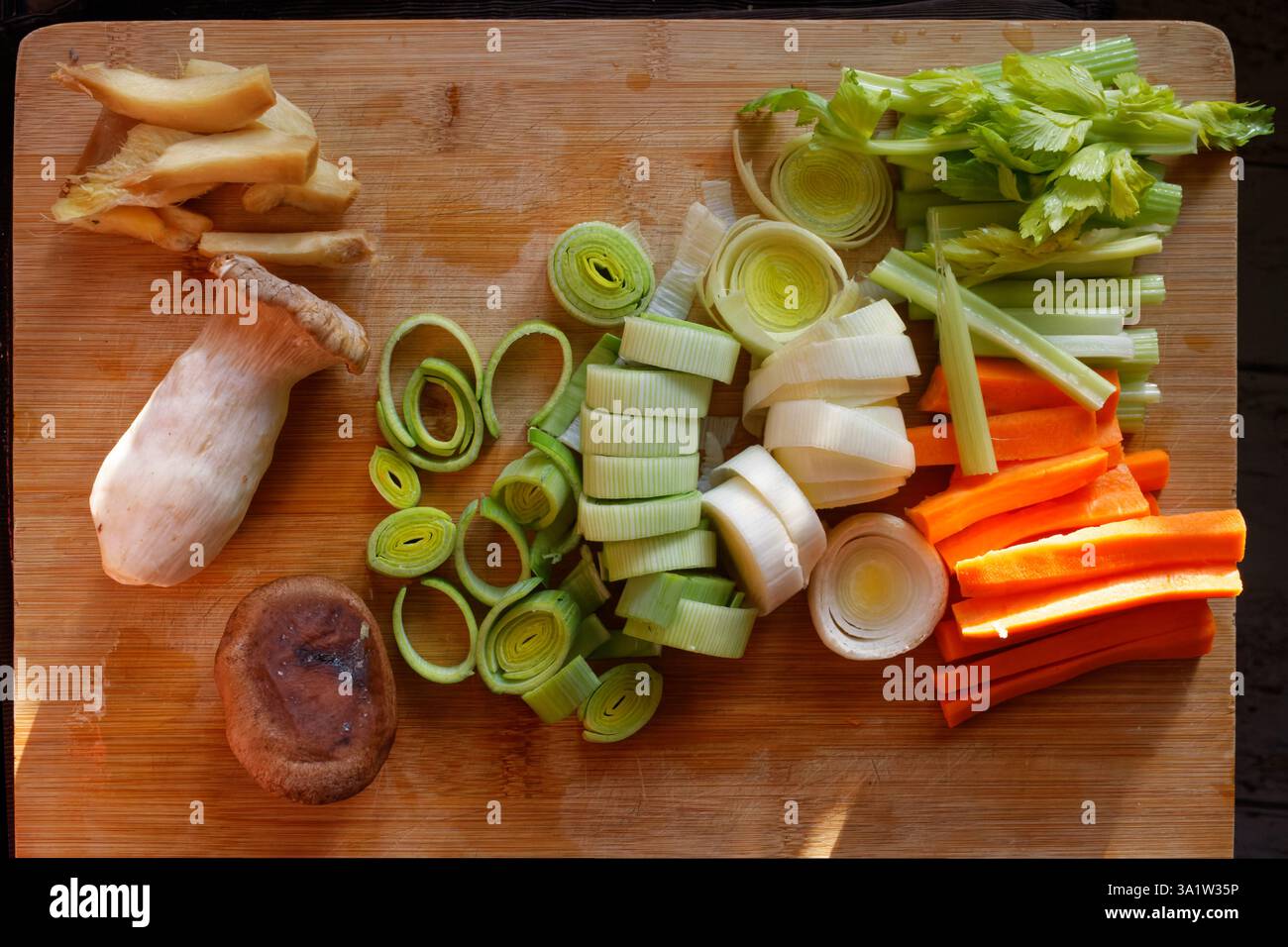 Assorted vegetables cut in preparation of an asian meal Stock Photo - Alamy