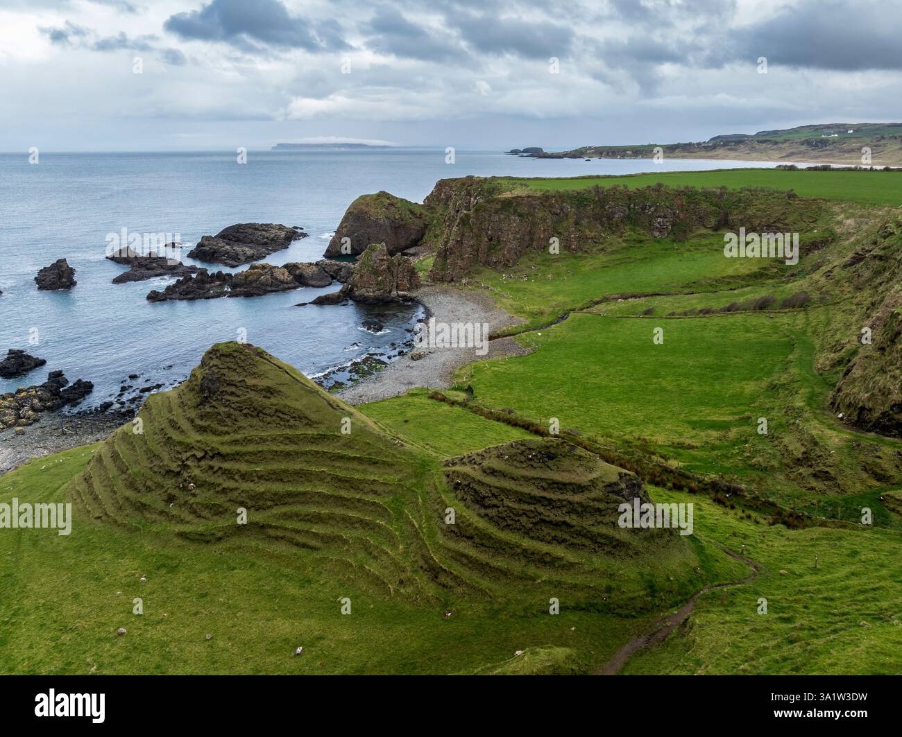 Aerial view of coastline near Dunseverick on the Causeway Coast, County ...