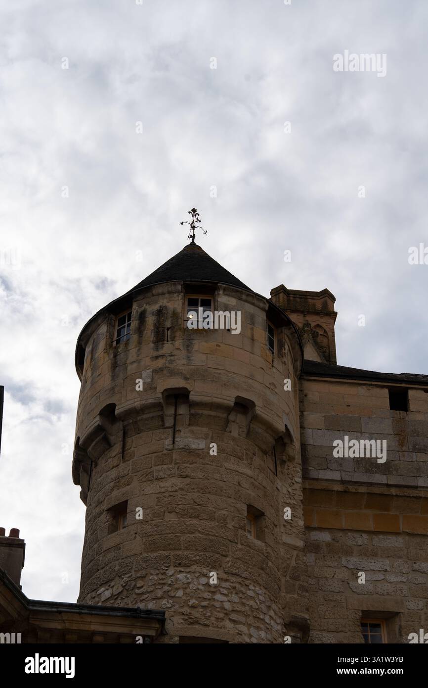 Historic tower rising above La Roche-Guyon, capturing the charm of ...