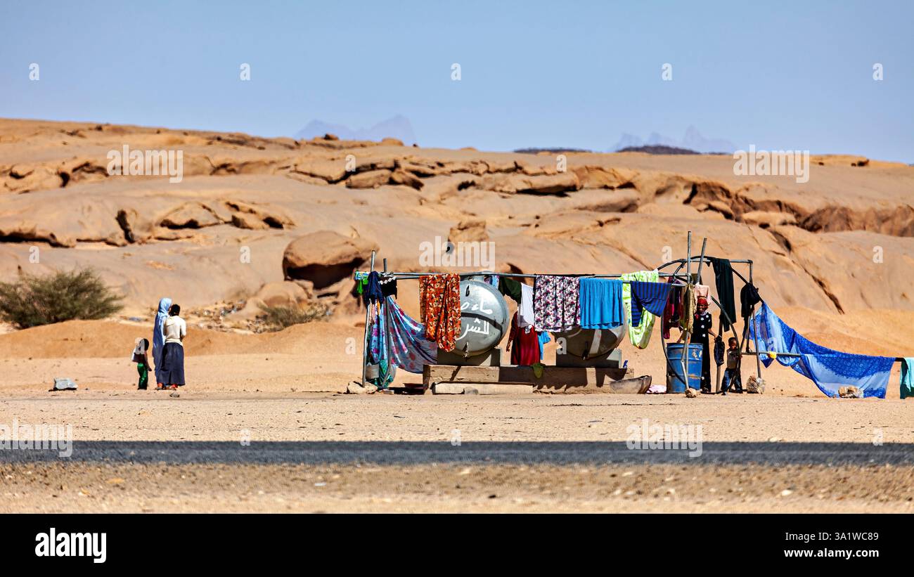 Women are cleaning and washing clothes in the sahara desert Stock Photo ...